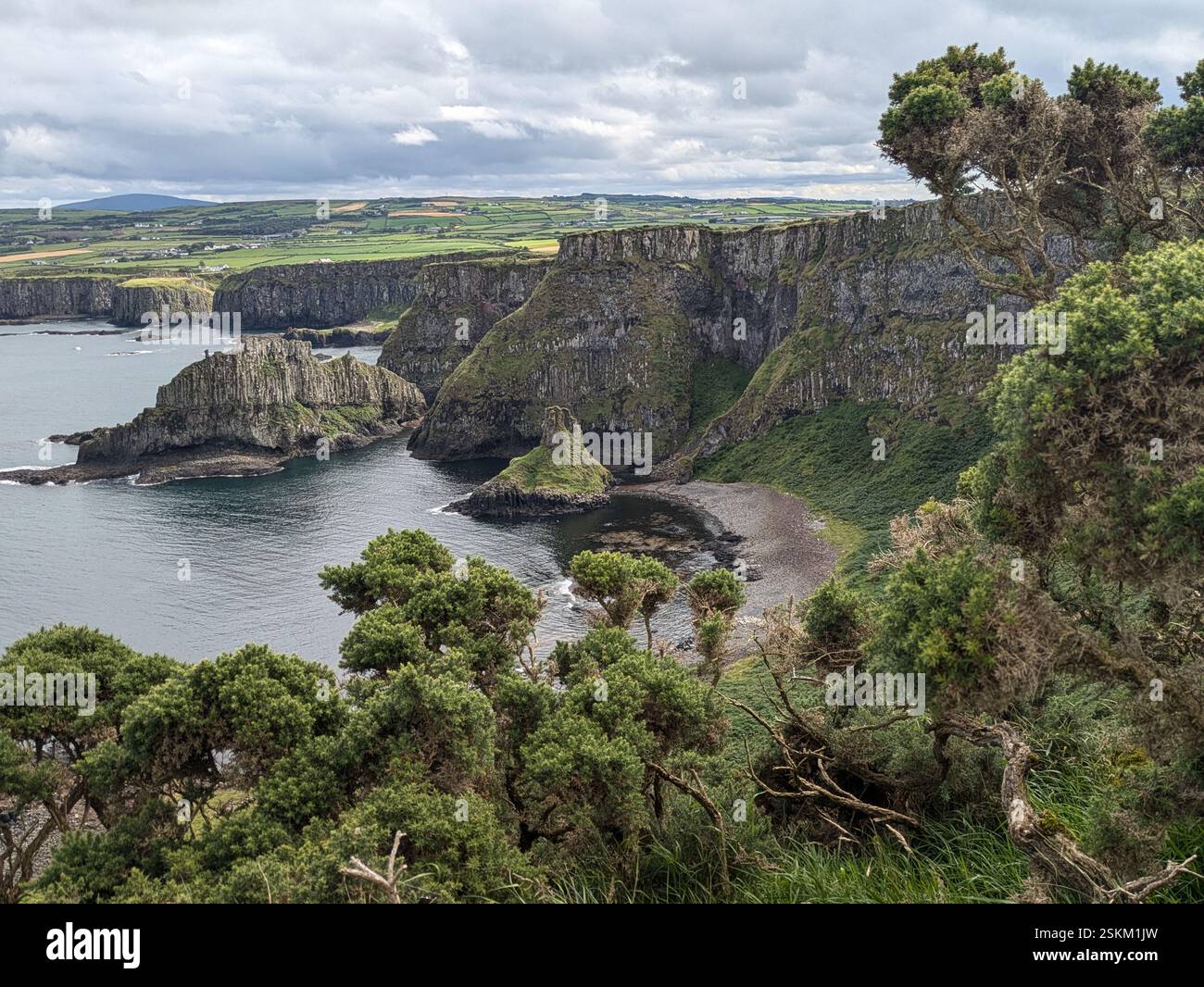hiking along the Giants Causeway cliffs Stock Photo - Alamy