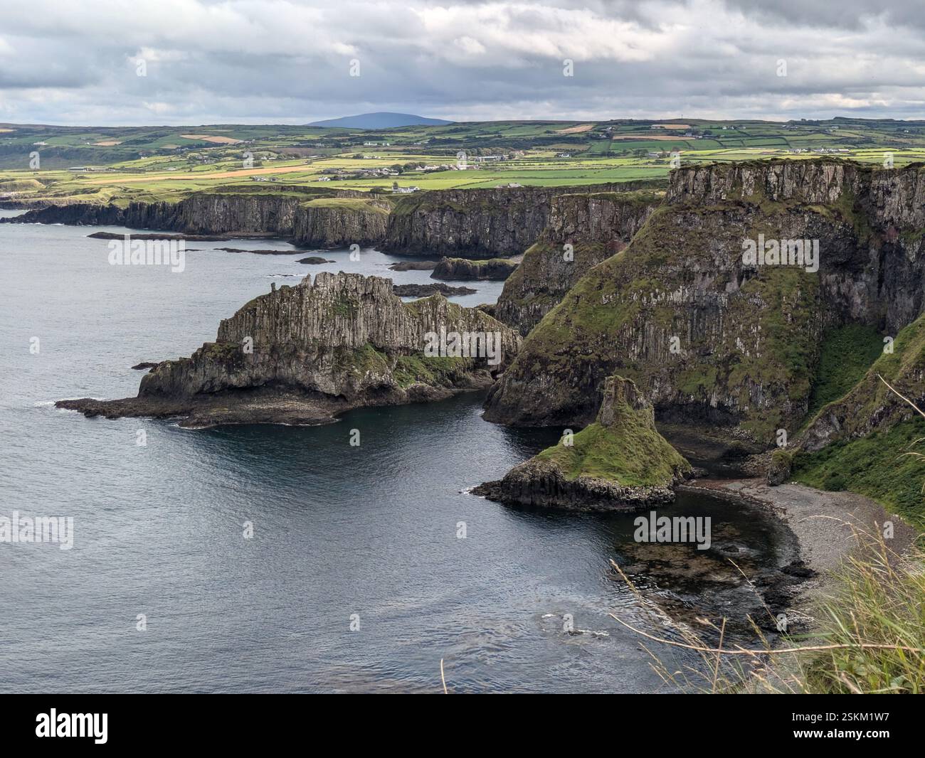 hiking along the Giants Causeway cliffs Stock Photo - Alamy