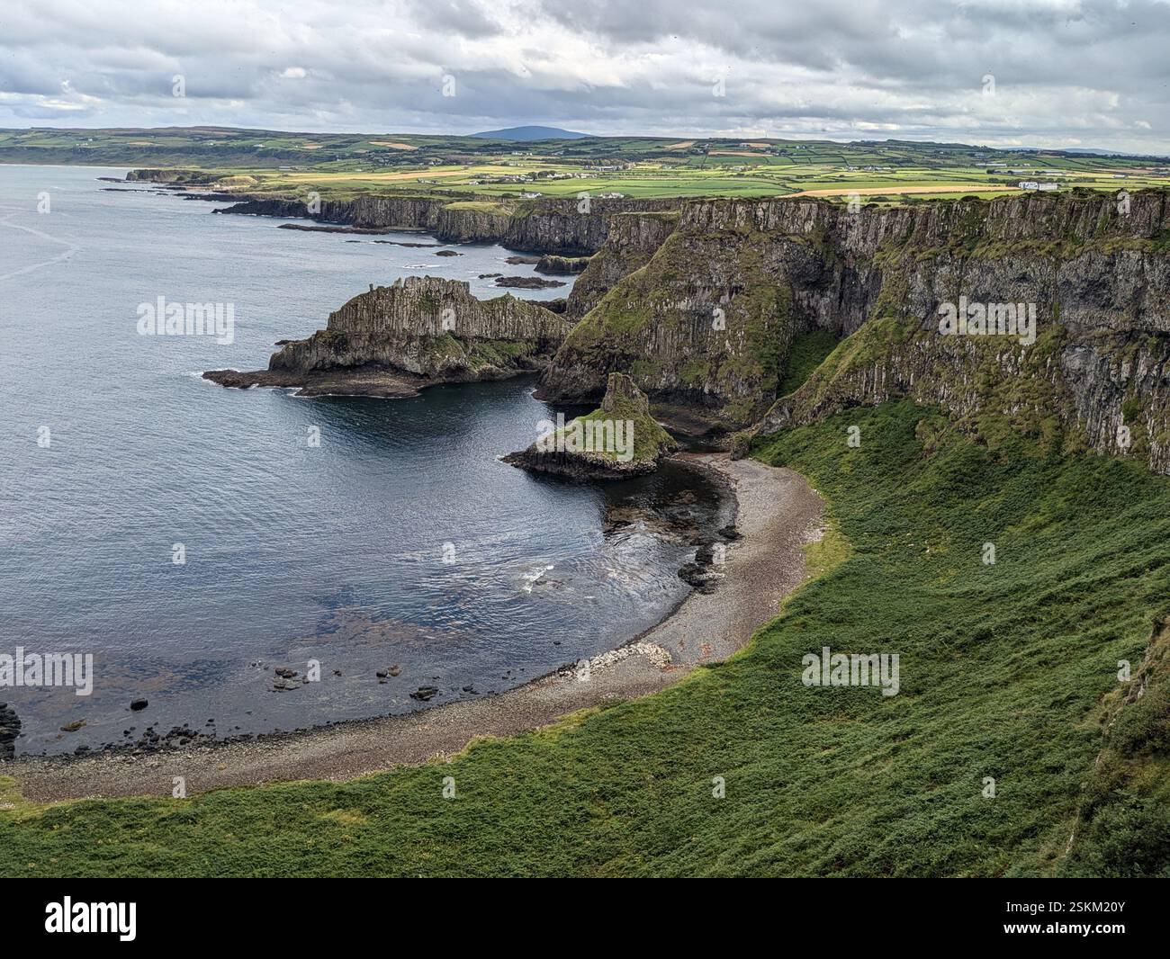 hiking along the Giants Causeway cliffs Stock Photo - Alamy
