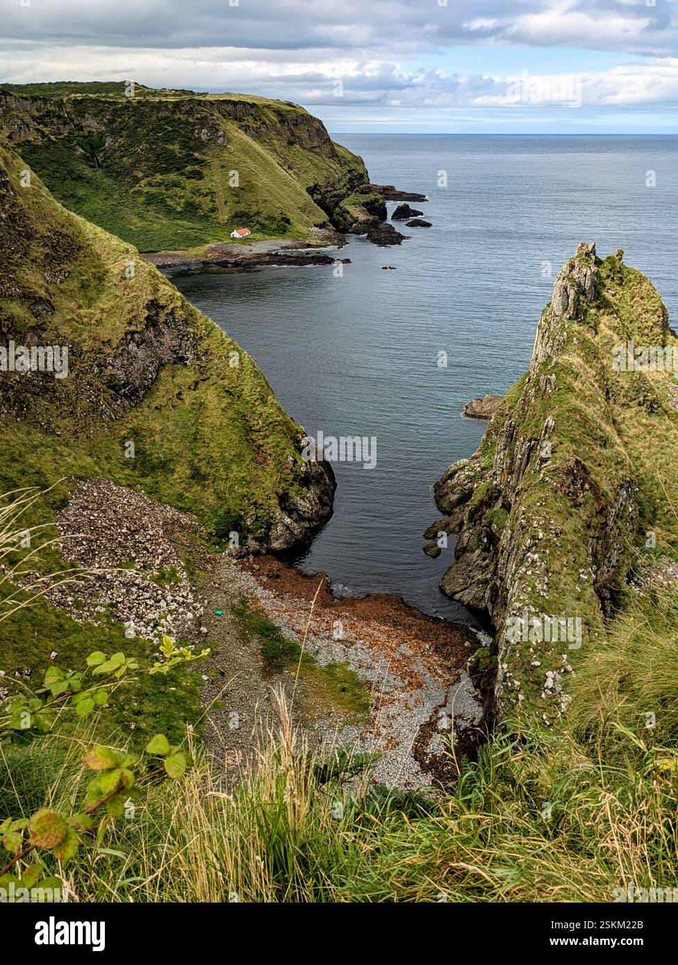 hiking along the Giants Causeway cliffs Stock Photo - Alamy