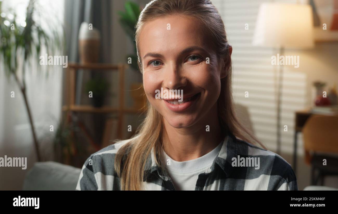 Portrait at home smiling happy smile carefree glad positive millennial ...