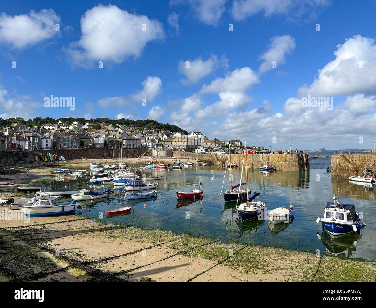 Low tide in the harbour of Mousehole, Cornwall, England Stock Photo - Alamy