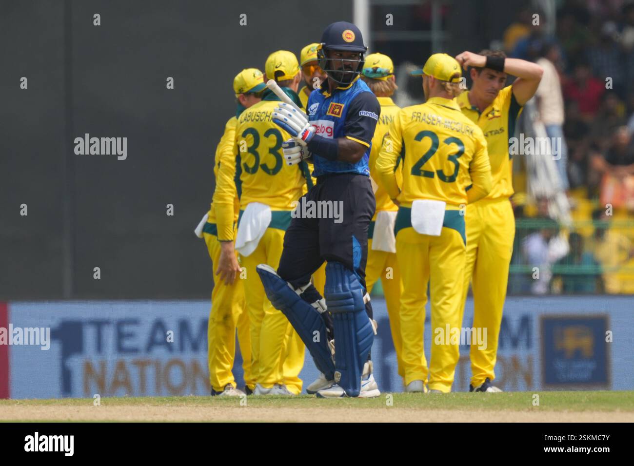 Janith Liyanage of Sri Lanka walks back after been dismissal during the ...
