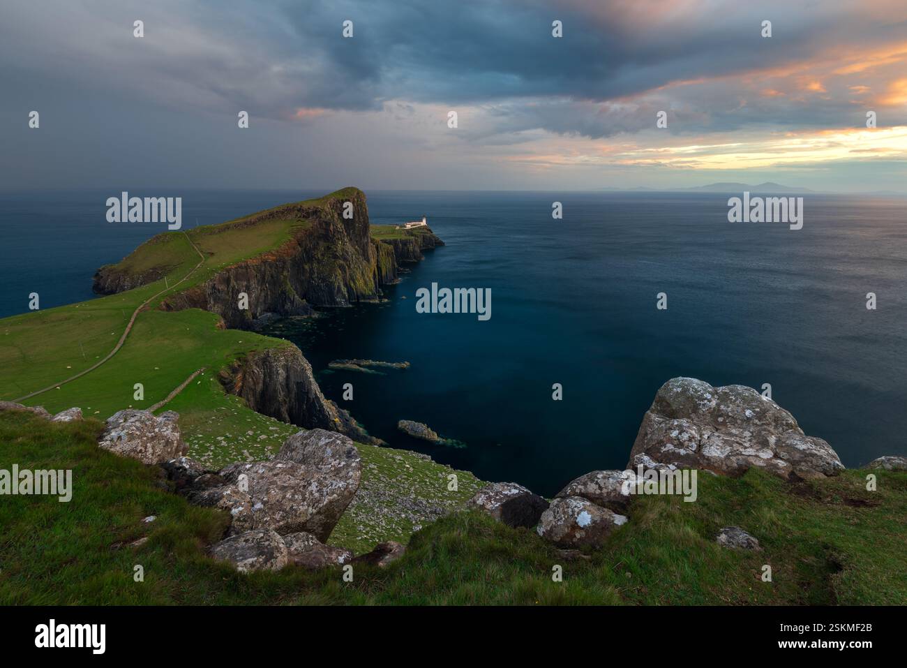 Neist Point, Isle of Skye, Scotland, UK. A stormy sky at sunset with ...