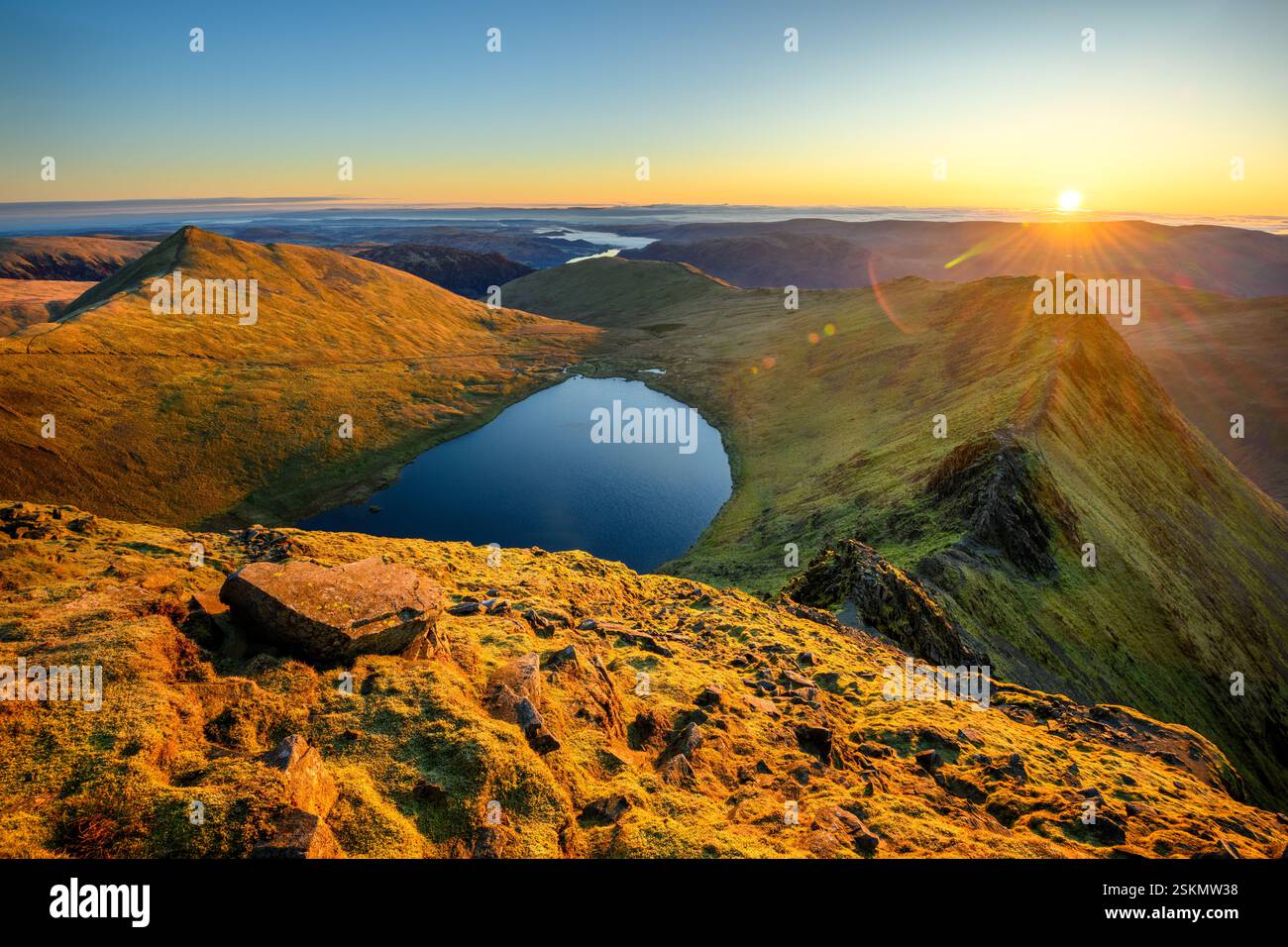 Golden sunrise from Helvellyn in The Lake District, overlooking ...