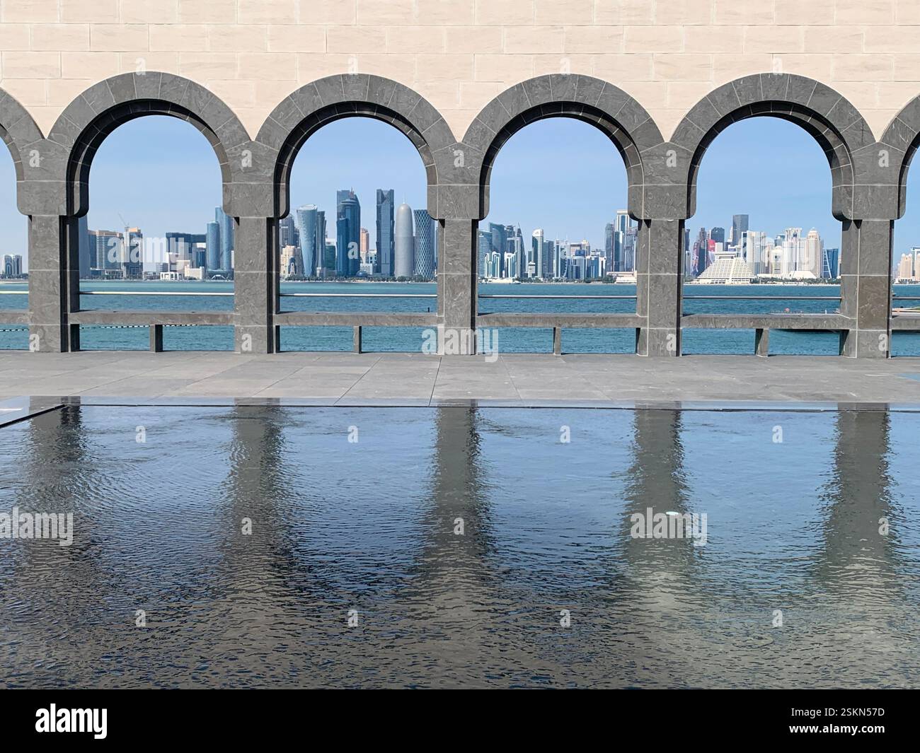 Wall arches with view of Doha from Museum of Islamic Art Stock Photo ...