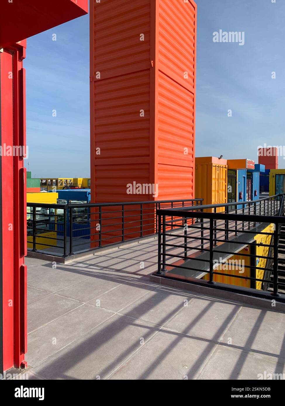 Colourful shipping containers in Doha Qatar Stock Photo - Alamy