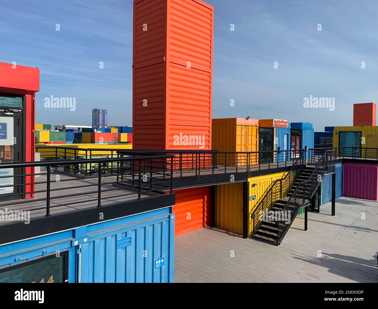 Colourful shipping containers in Doha Qatar Stock Photo - Alamy