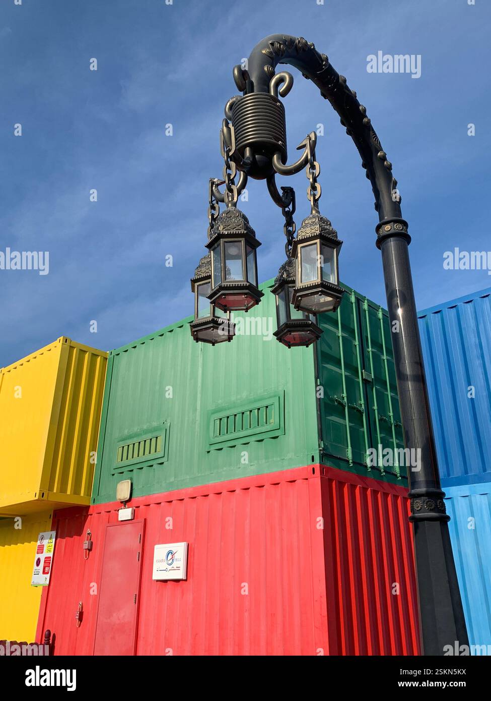 Colourful shipping containers at Doha Old Port Stock Photo - Alamy