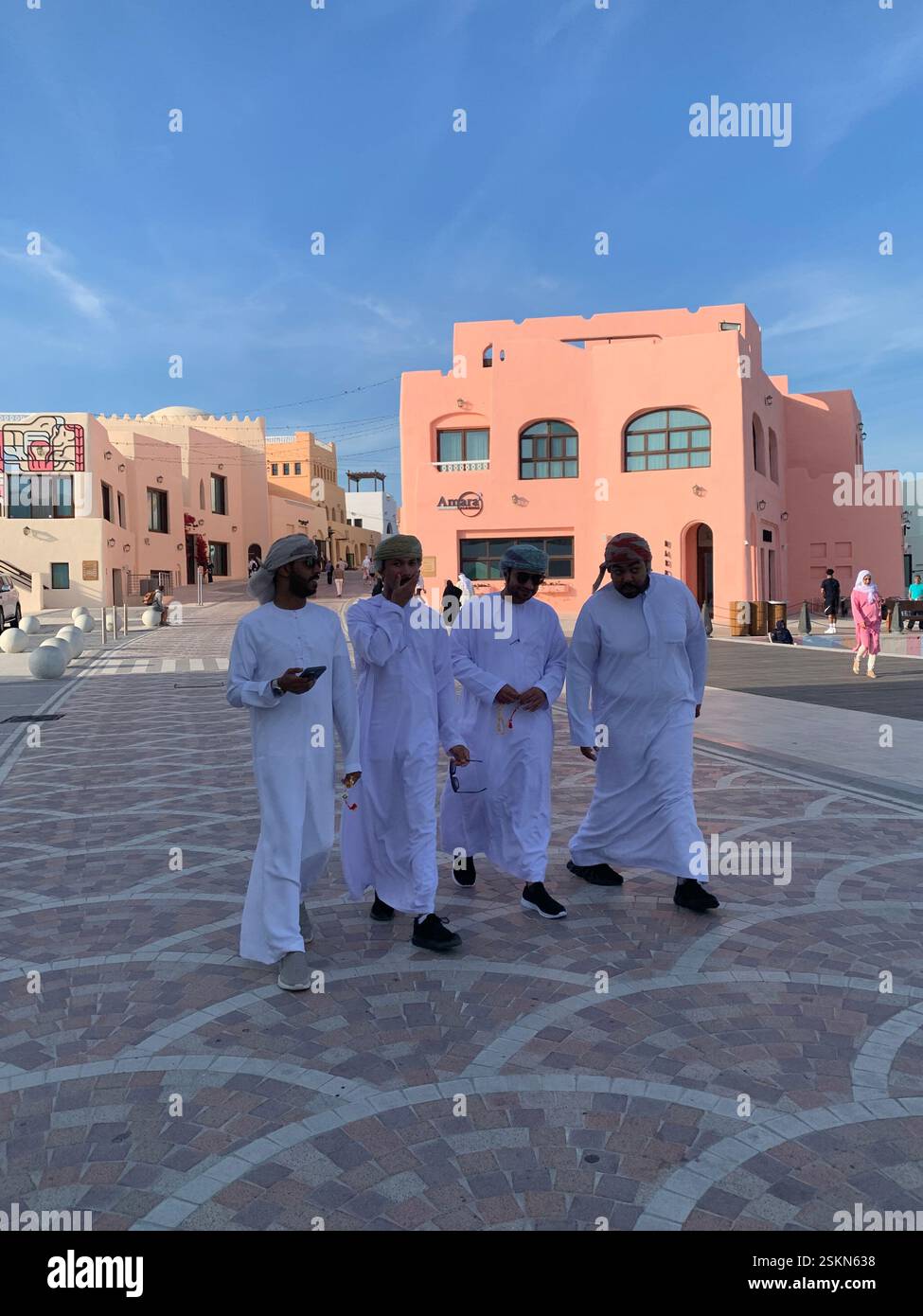 Pastel colour clay buildings in Doha Old Port Stock Photo - Alamy