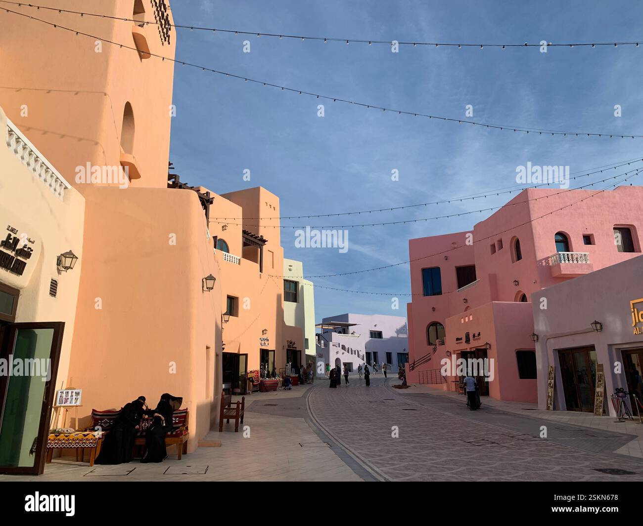 Pastel colour clay buildings in Doha Old Port Stock Photo - Alamy