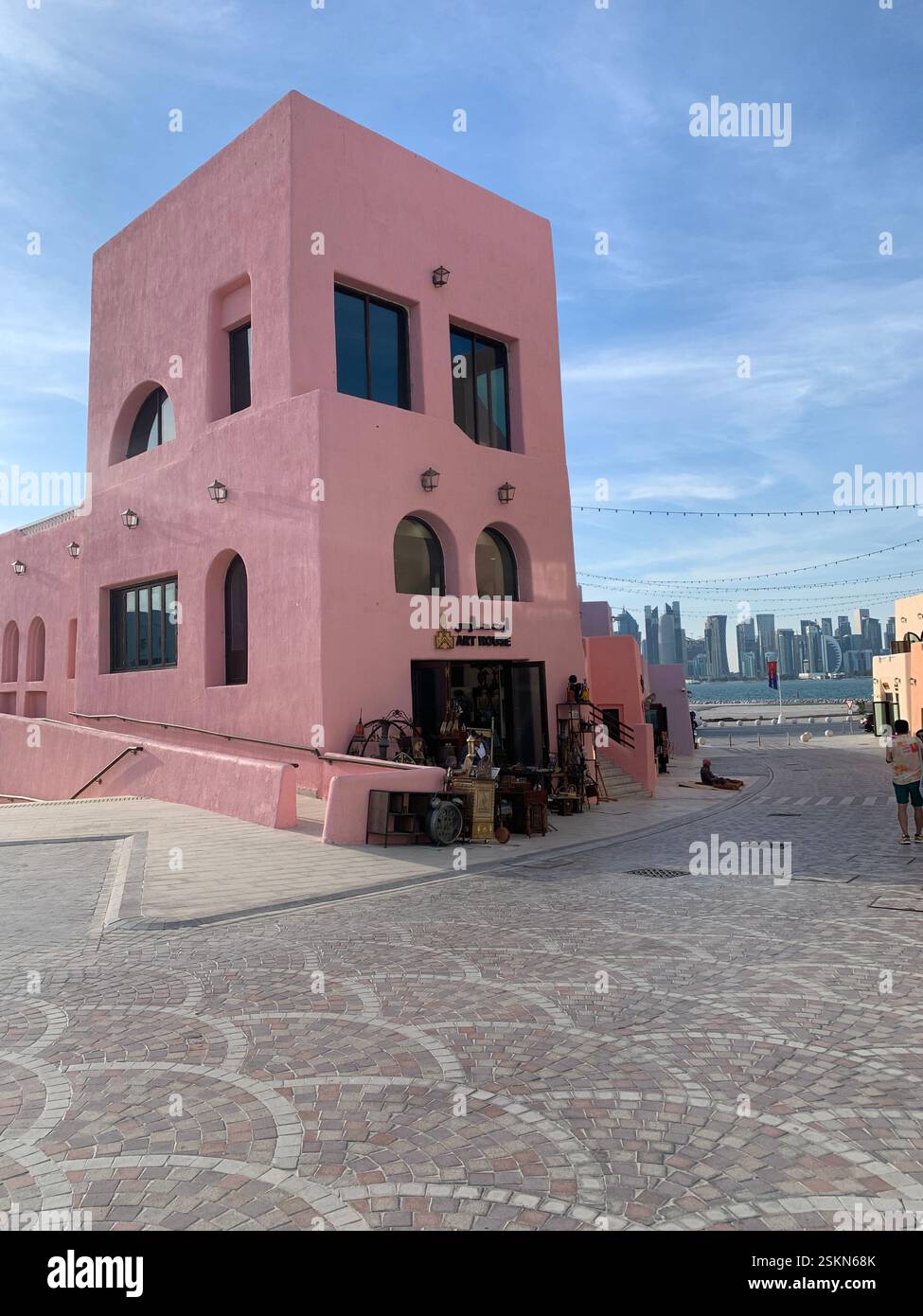Pastel colour clay buildings in Doha Old Port Stock Photo - Alamy