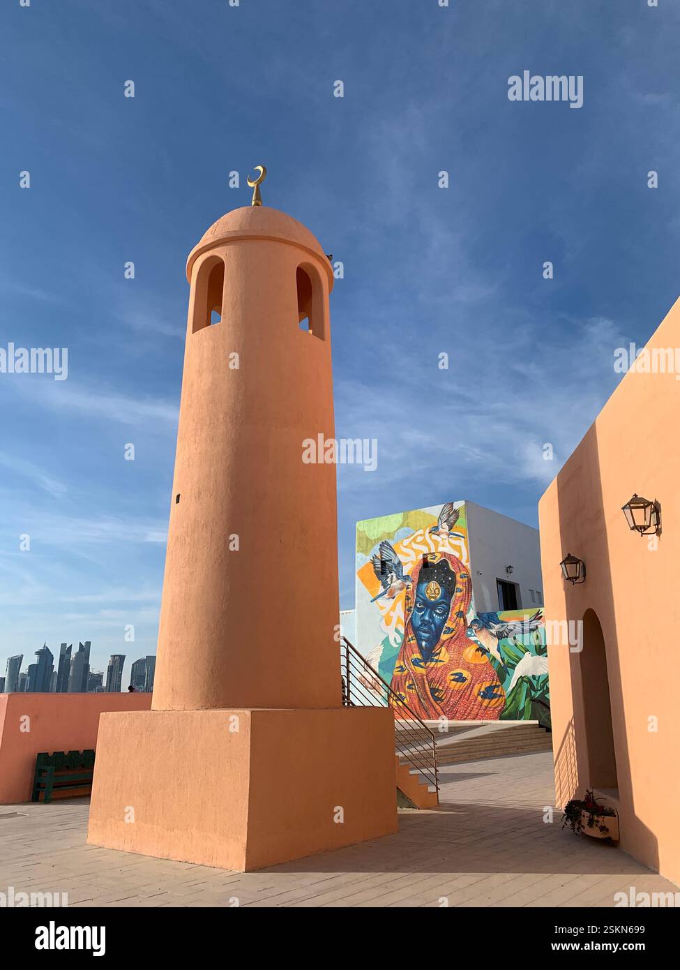 Pastel colour clay buildings in Doha Old Port Stock Photo - Alamy