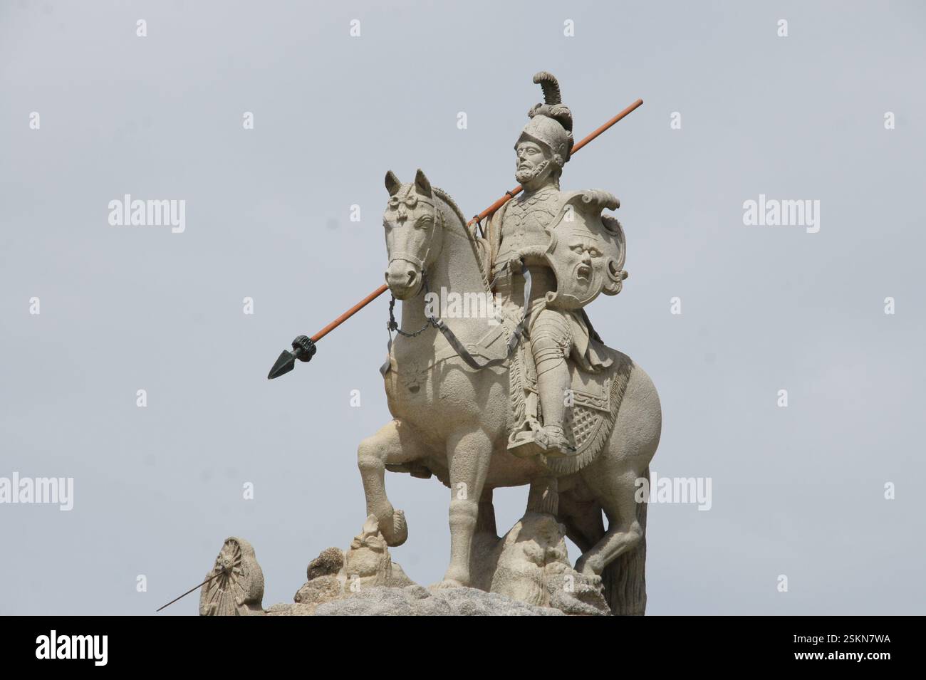 Equestrian statue in Braga, Portugal. A knight, clad in shining armor ...