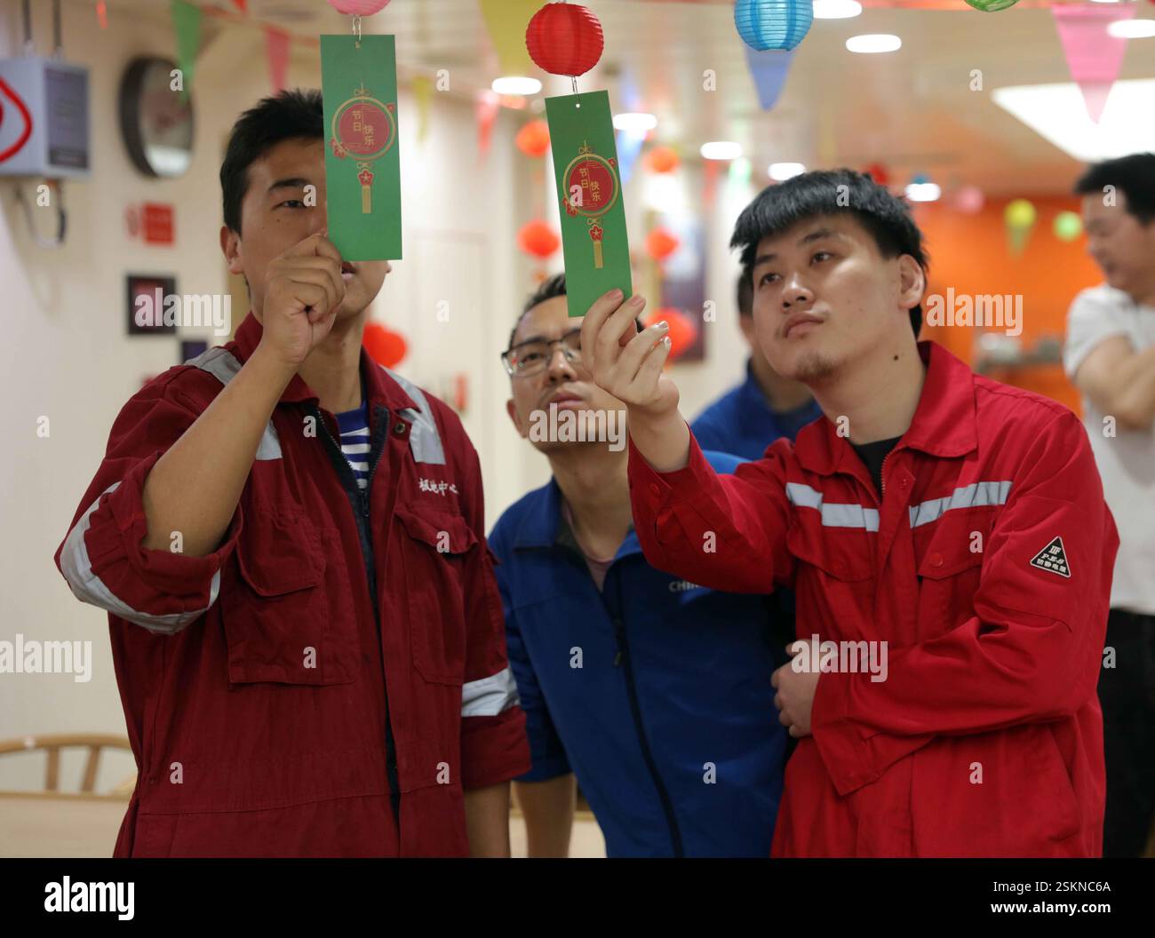 Aboard Xuelong 2. 12th Feb, 2025. Members of China's 41st Antarctic ...