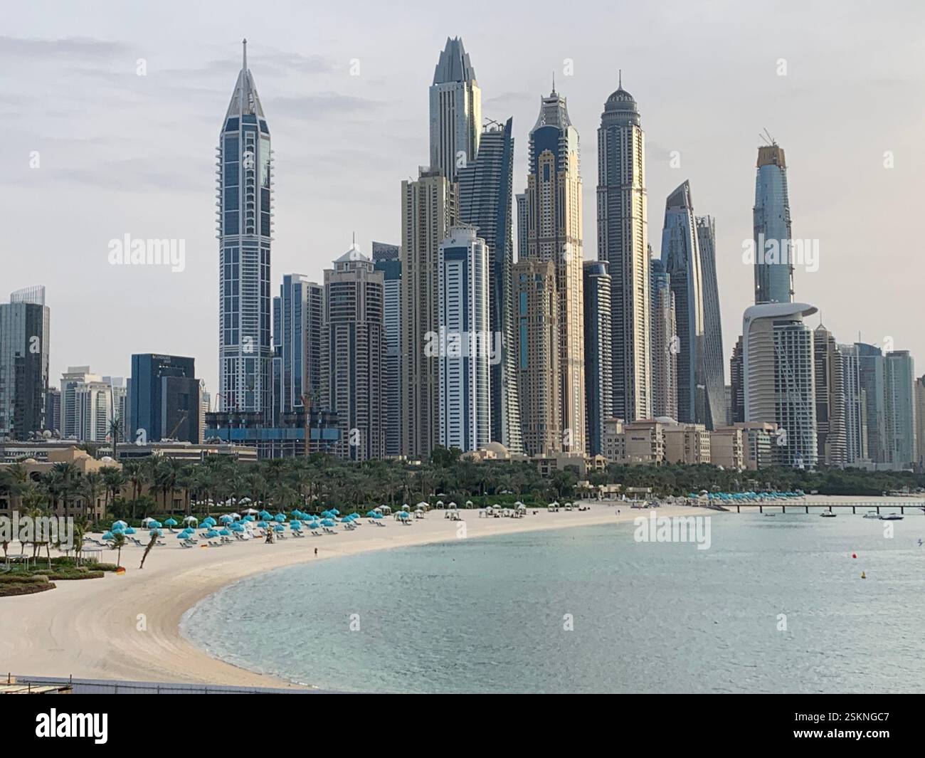 Dubai Marina buildings along seafront as seen from afar Stock Photo - Alamy