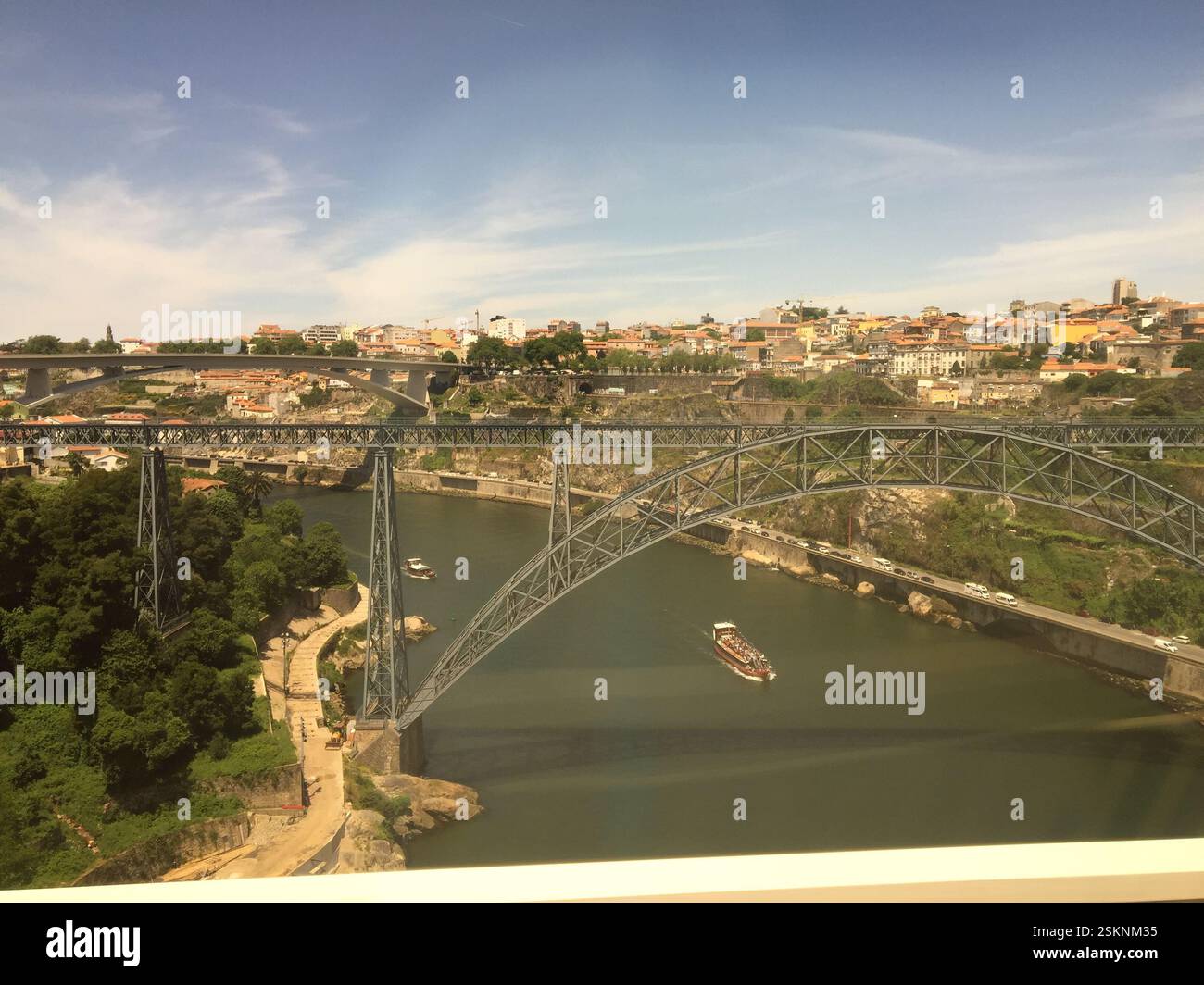 Porto, Braga, Portugal. Two iconic bridges gracefully arch over the ...