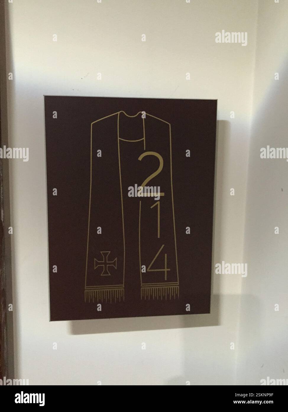 Wall-mounted sign. Brown background with gold accents. Depicts stole ...