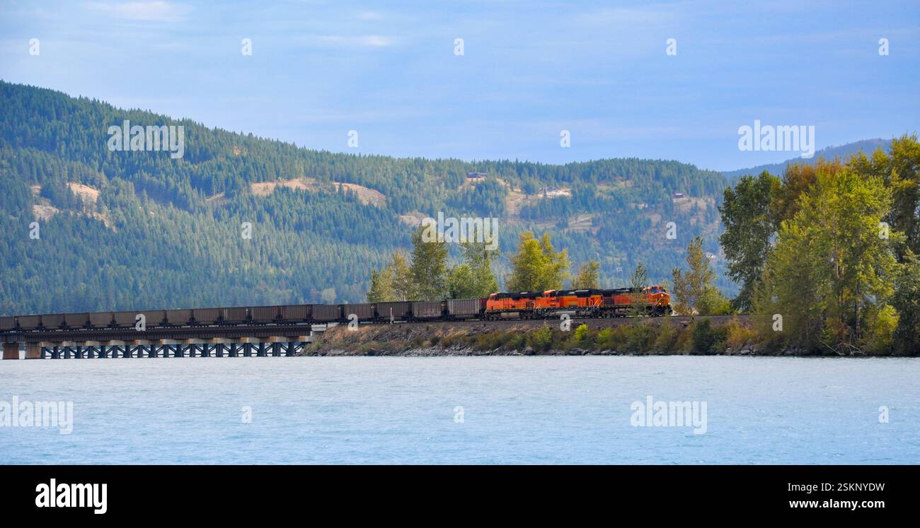 Freight Train driving across a Bridge over the Columbia River ...