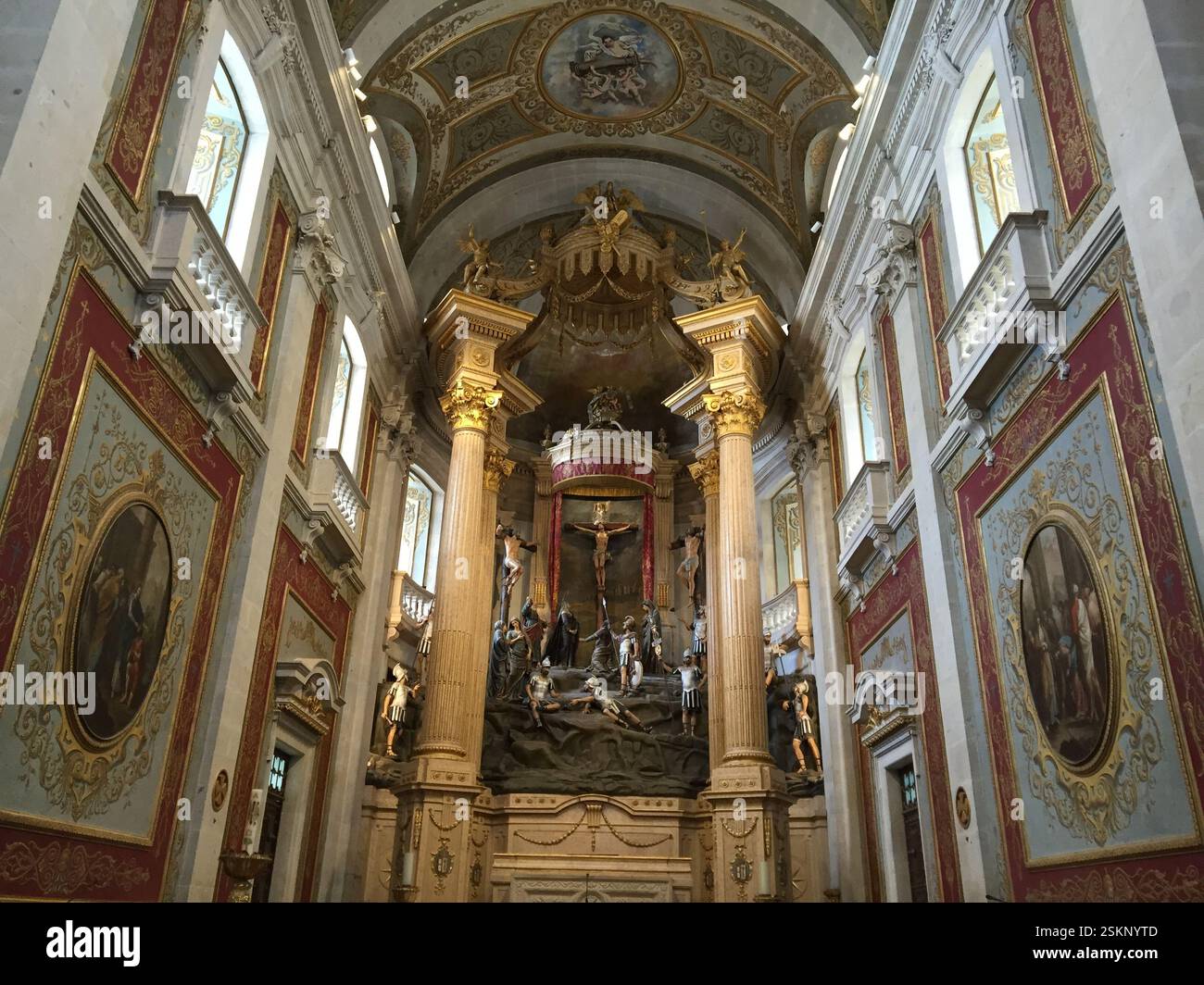 Imposing cathedral interior, Braga, Portugal. Elaborate altar adorned ...