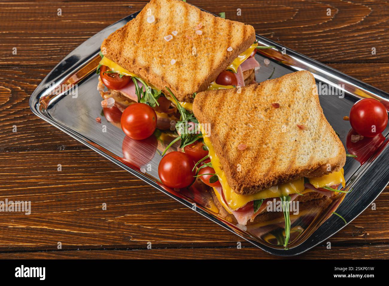 Enjoy a delicious grilled sandwich made with layers of melted cheese ...