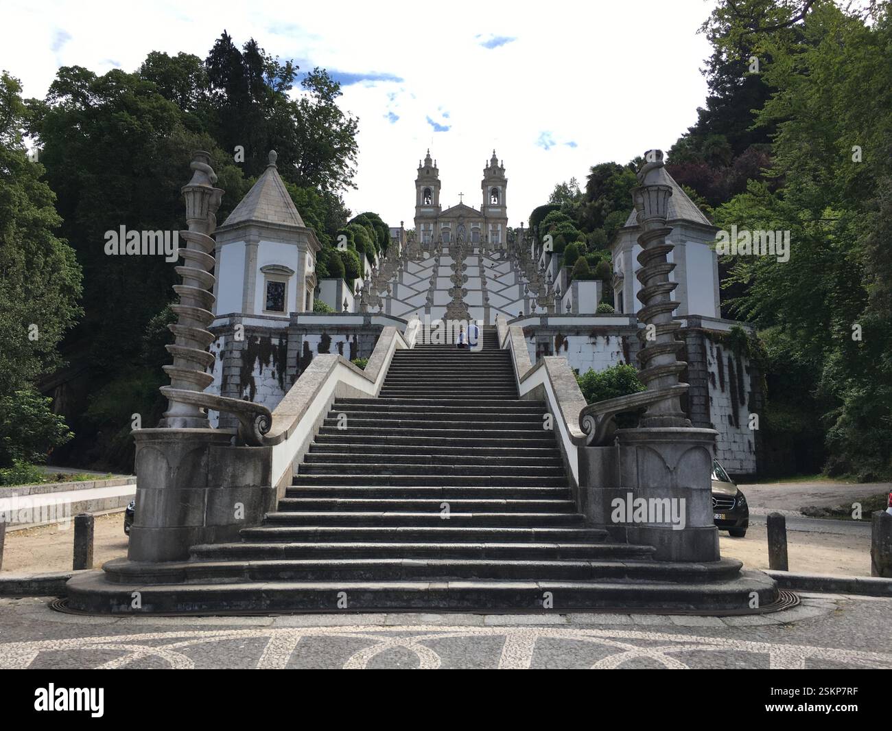 Staircase leading to a grand Braga church. Twin towers frame the ...
