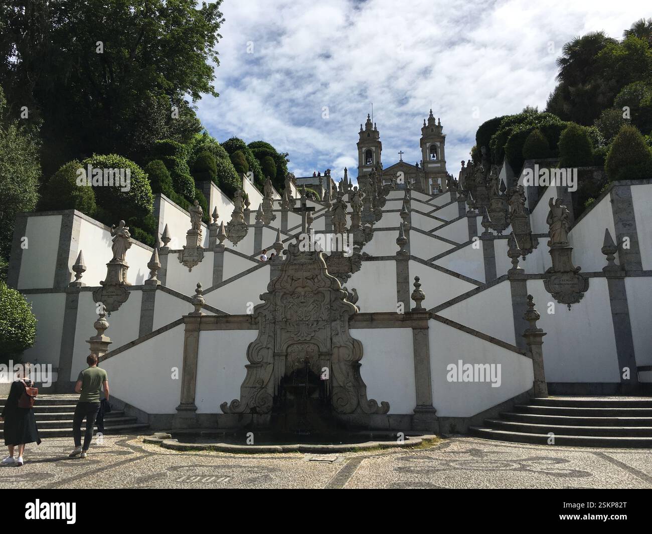 Staircase leading to a grand Braga church. White stone steps with ...