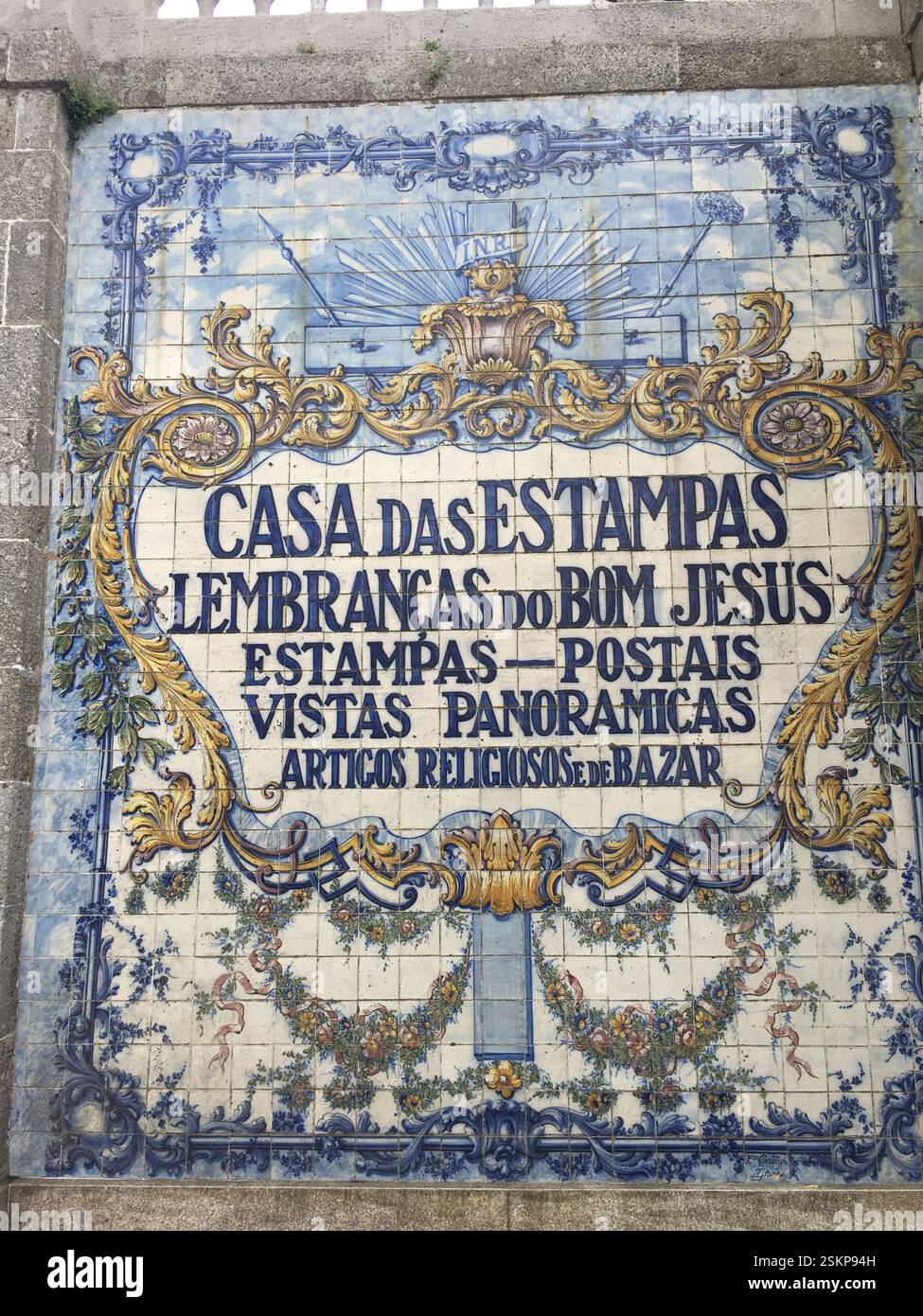 Azulejo tilework depicts religious iconography, shrine, and staircase ...