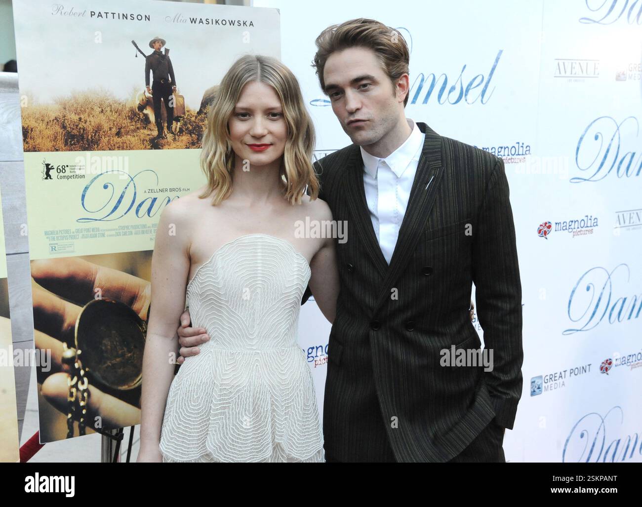 Mia Wasikowska (L) and Robert Pattinson arriving at the Los Angeles ...