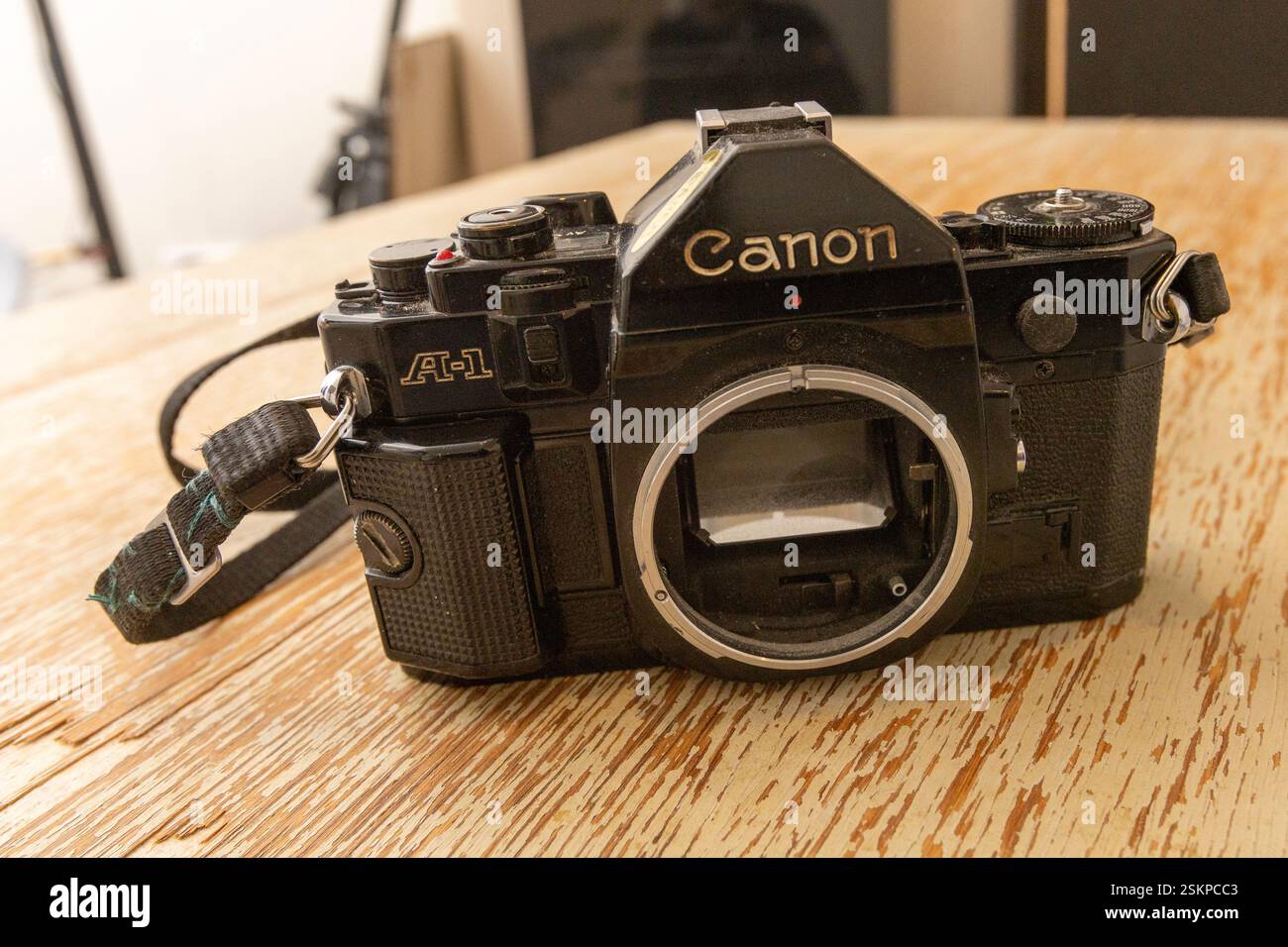 A well used soiled Canon A-1 35mm film single lens reflex camera with ...