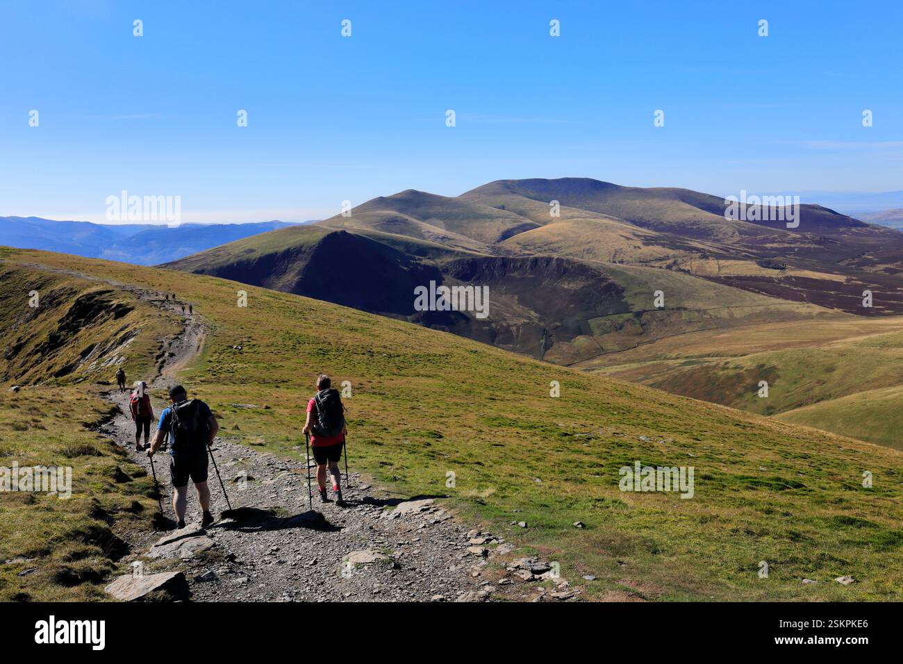 Walkers at the summit of Blencathra fell, Lake District National Park ...