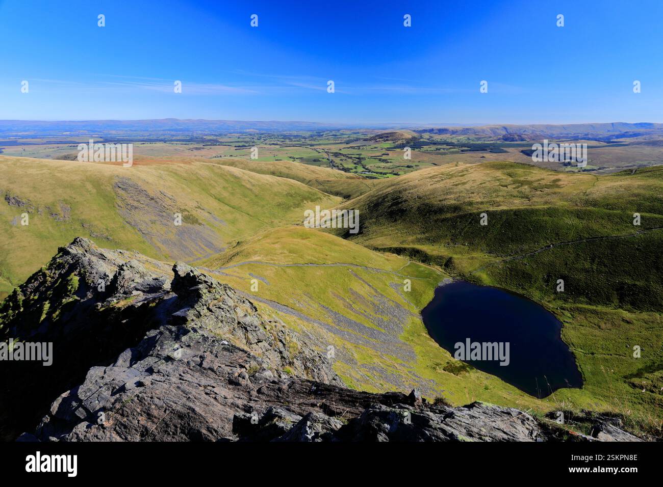 View of Scales Tarn from Sharp Edge, Blencathra fell, Lake District ...
