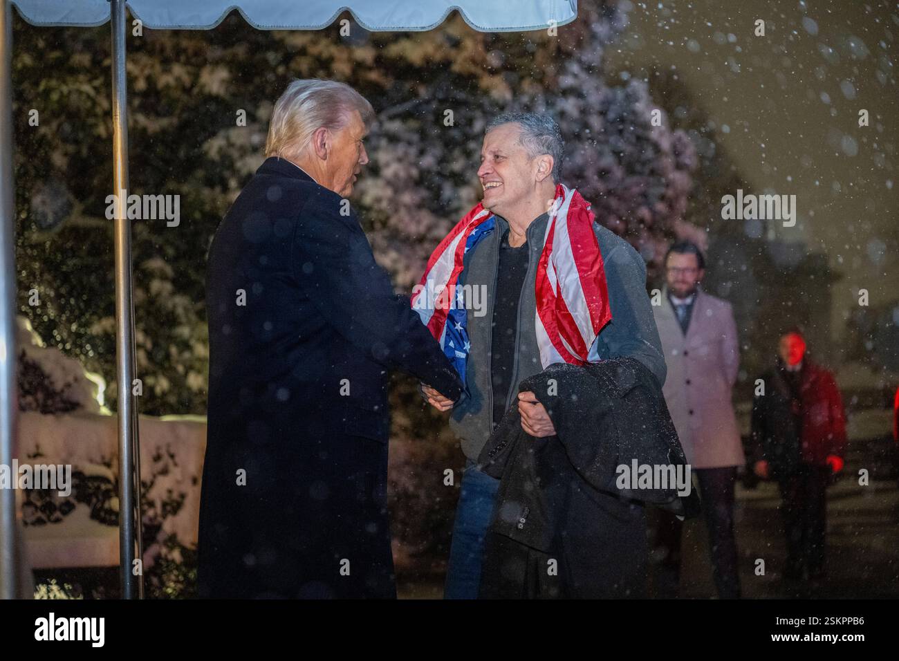 US President Donald Trump welcomes Mark Fogel, who was recently ...