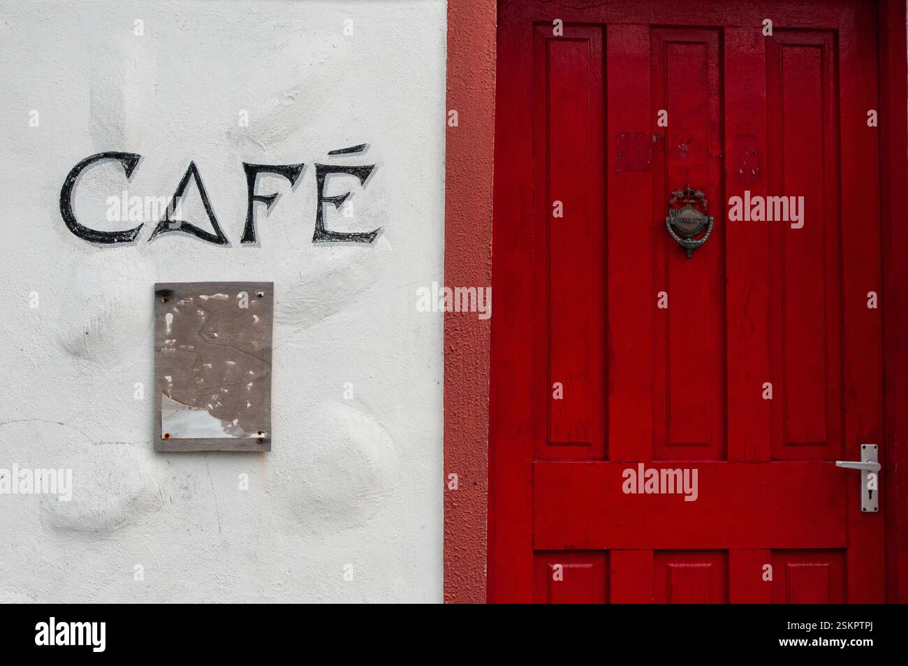 Sign marking the entrance to a rustic cafe on the remote island of ...