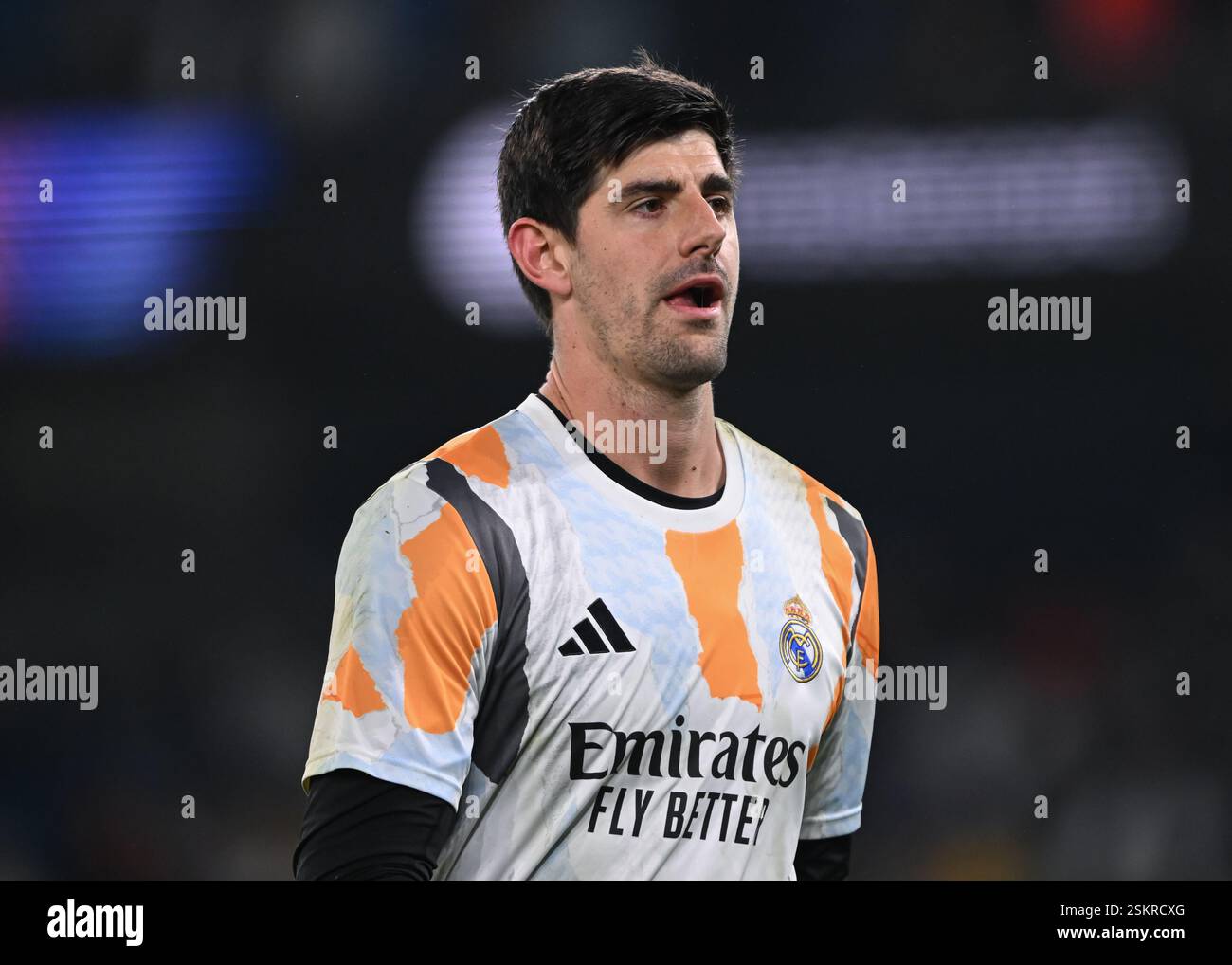 Manchester, UK. 11th Feb, 2025. Thibaut Courtois of Real Madrid warms ...