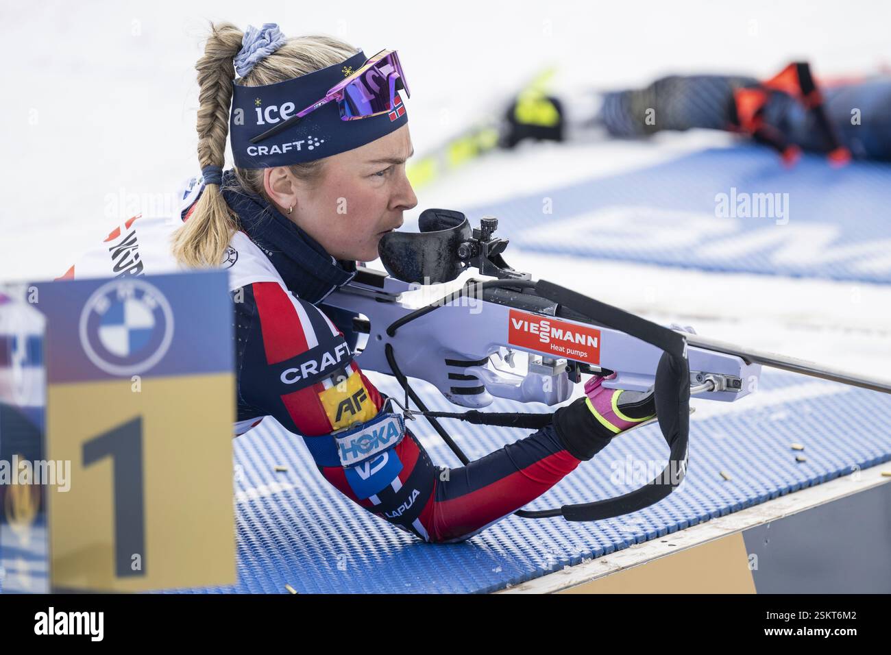 Ingrid Landmark Tandrevold of Norway gets ready to shoot her rifle ...