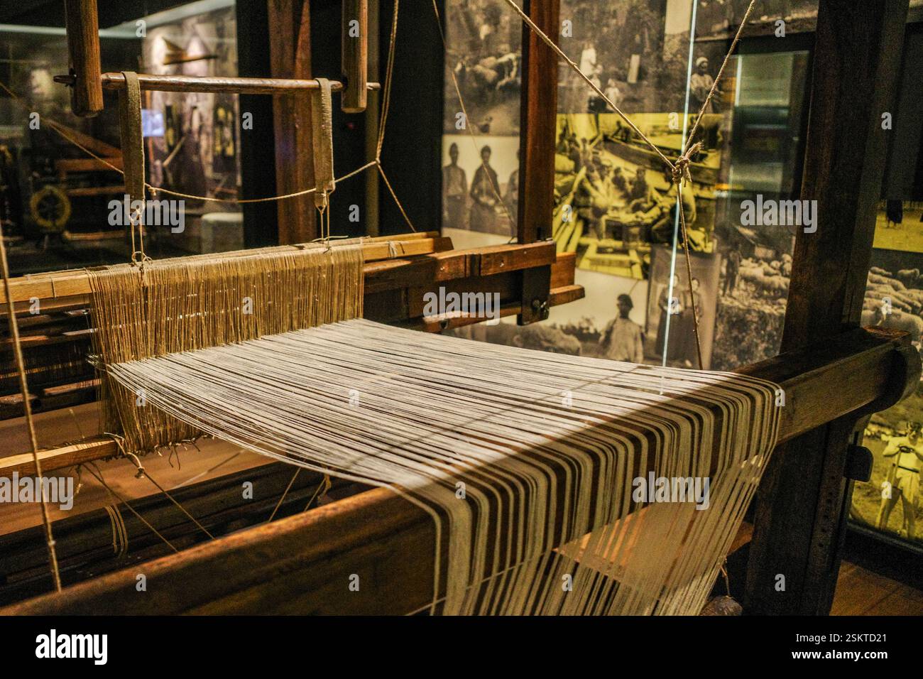San Sebastian, Spain - 9 Feb 2025: Traditional textile loom on display ...