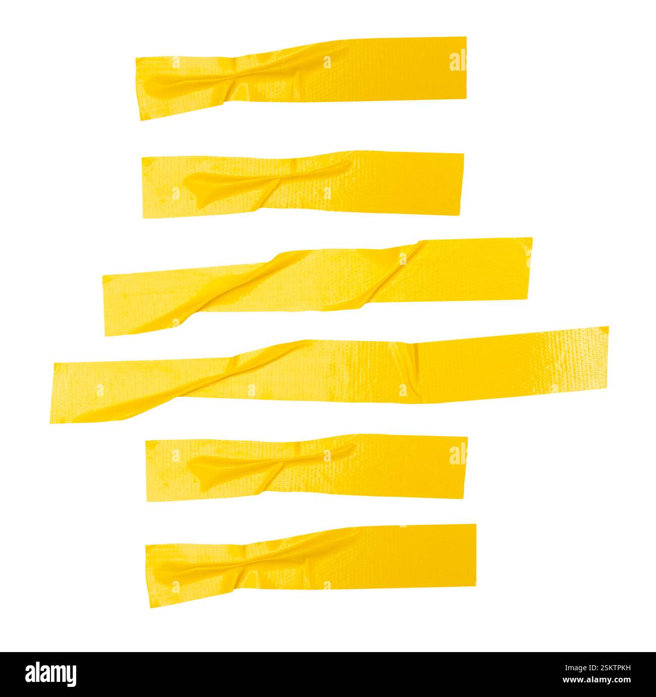 Top view set of wrinkled or crumpled yellow adhesive vinyl tape or ...