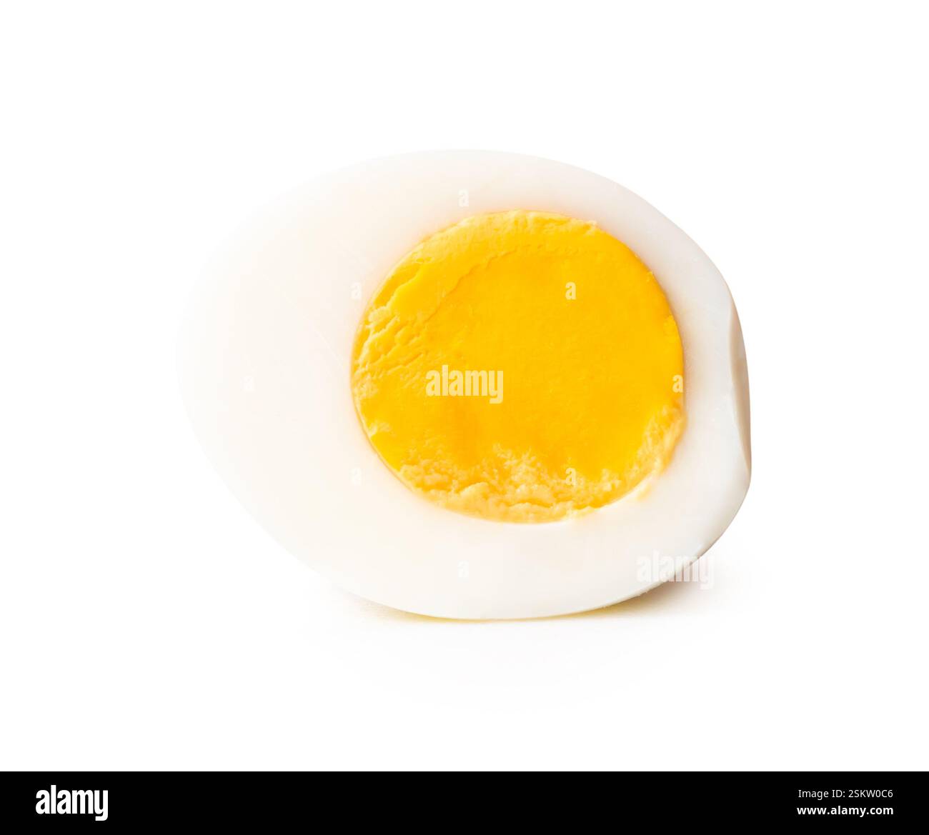 Side view of single cooked or boiled egg with egg yolk in half is ...
