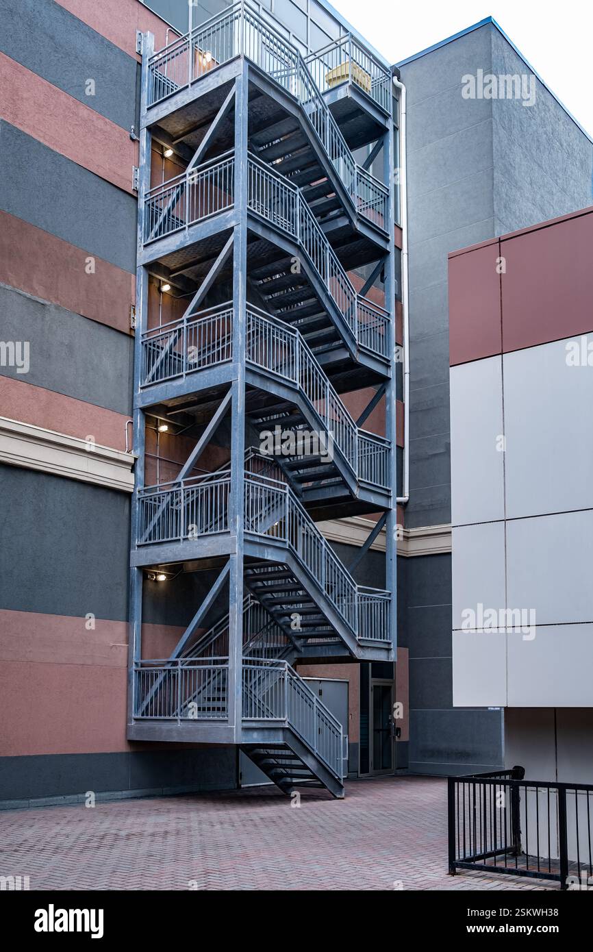 Urban building with fire escape. Fire escape on facade of old ...