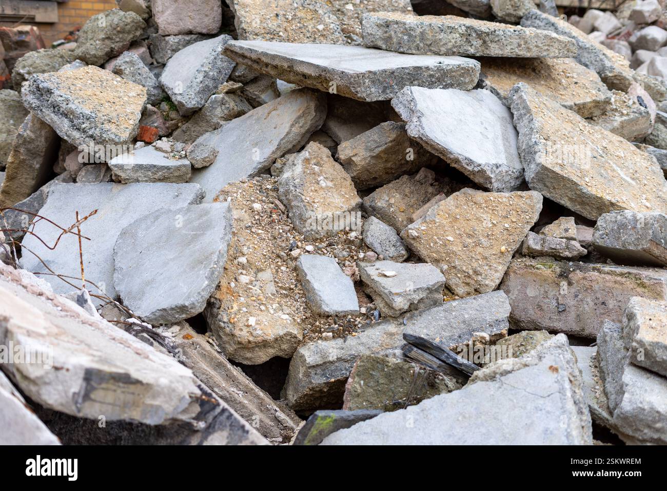 stack of old pieces of concrete, demolition of construction site ...