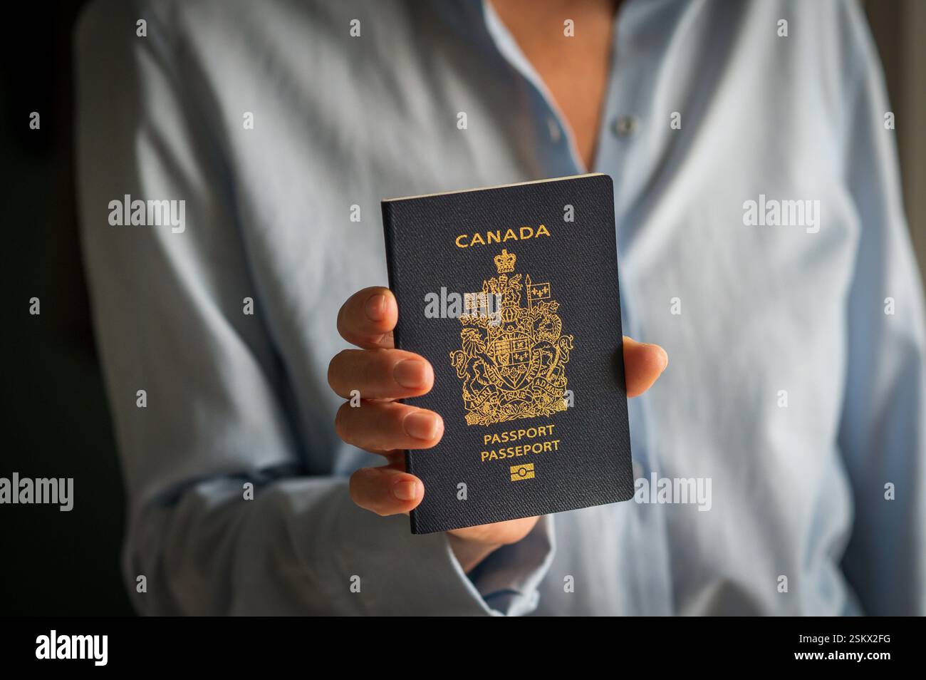 Anonymous female in full sleeves shirt hand while standing ...