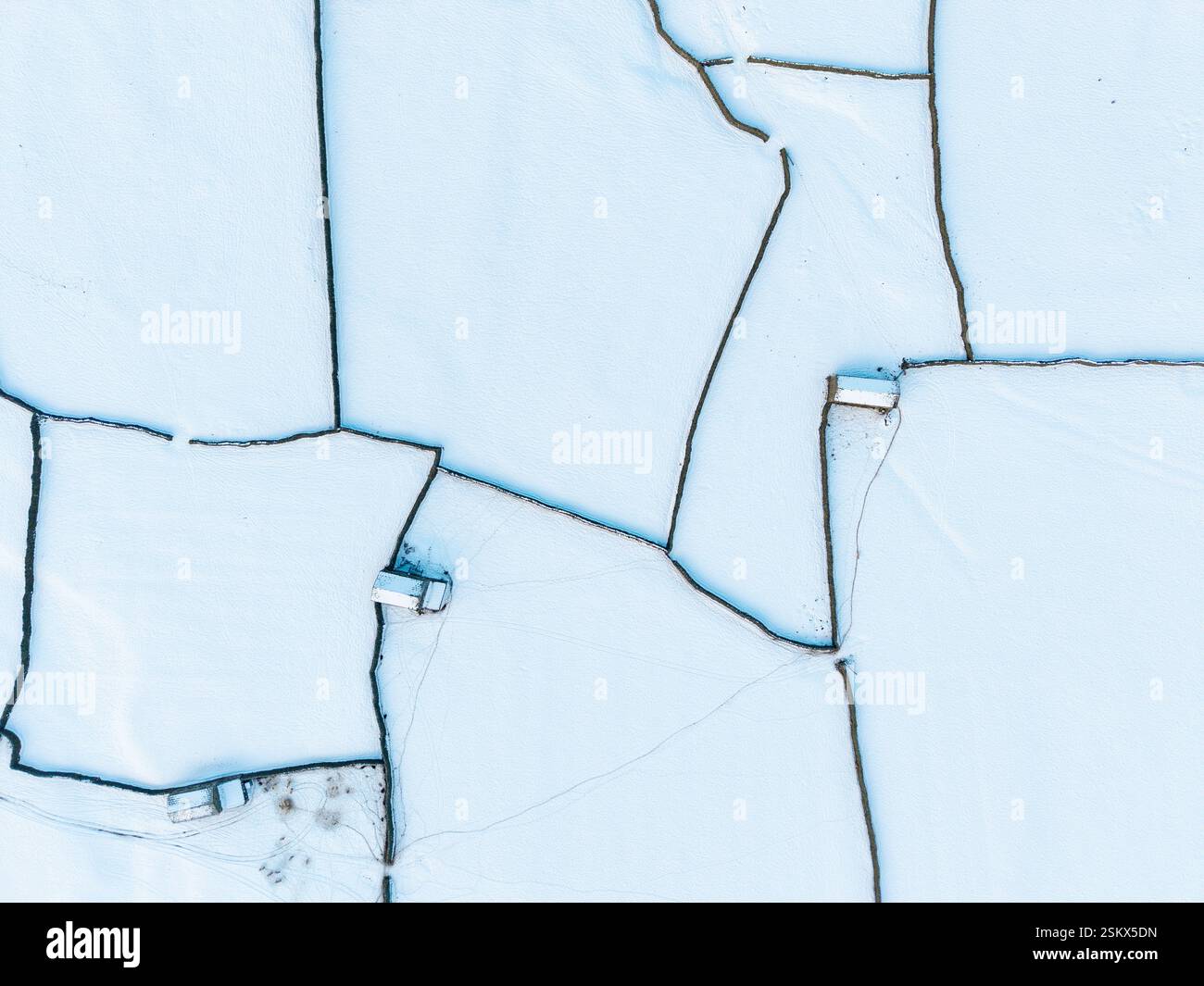 Meadows at Gunnerside in Swaledale covered with snow, showing the ...