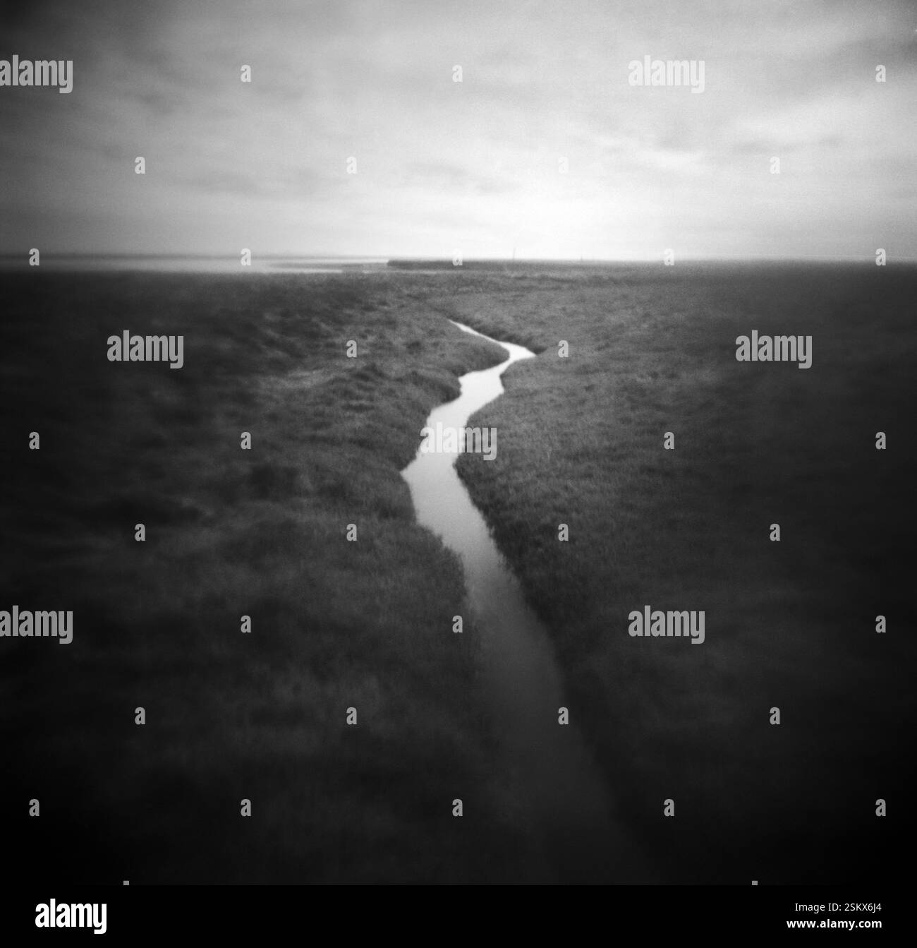 Black and white image of a stream running through the Westfjords ...