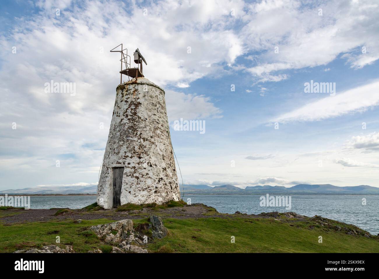 Twr Bach lighthouse at the tip of Llanddwyn Island on Anglesey, North ...