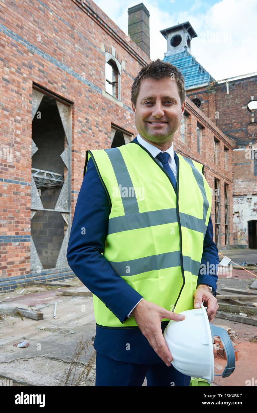 George clarke in blue suit and hi vis hi-res stock photography and ...