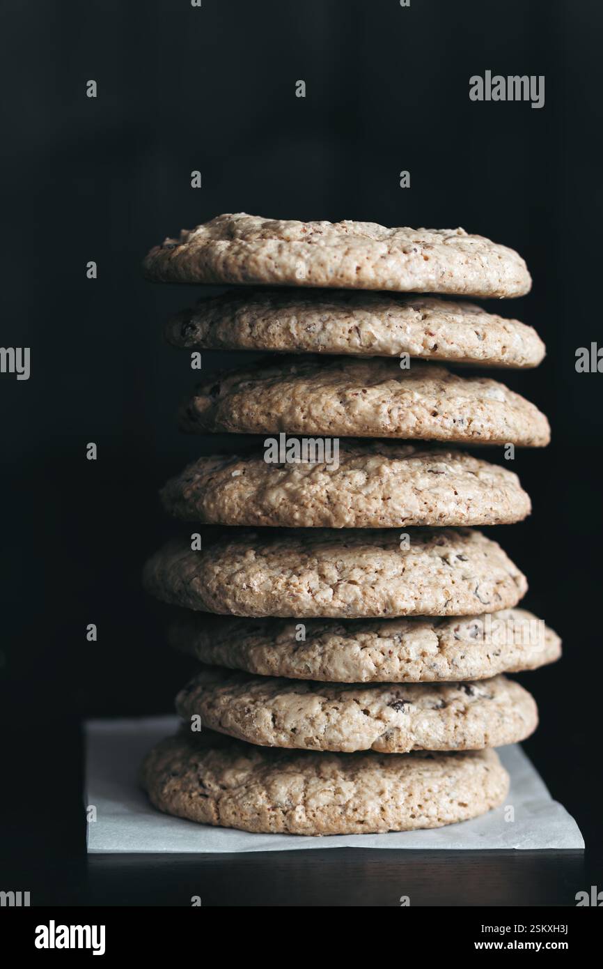 A tall stack of homemade gluten-free chocolate chip cookies with a ...