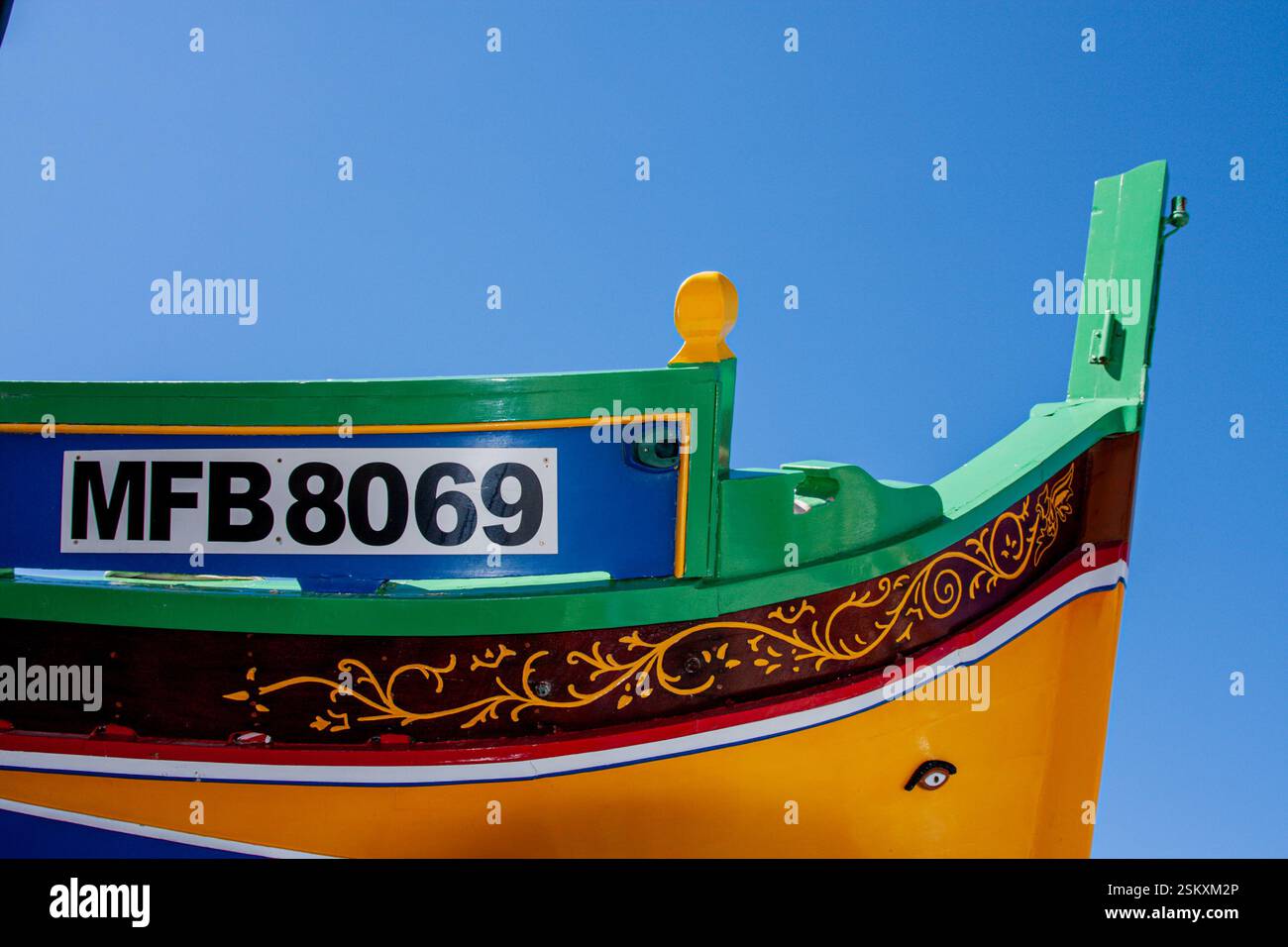 Prow of brightly decorated 'luzzu' - traditional Maltese fishing boat ...