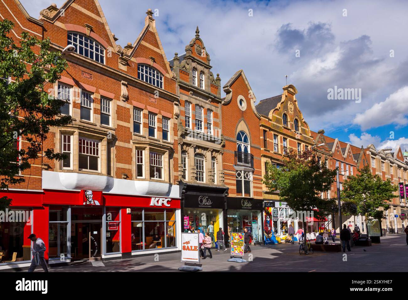 Attractive ornate architecture above shop fronts on the pedestrianised ...