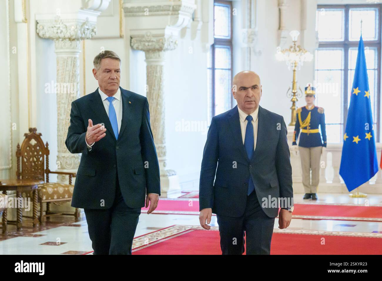 (250212) -- BUCHAREST, Feb. 12, 2025 (Xinhua) -- Klaus Iohannis (L) and ...